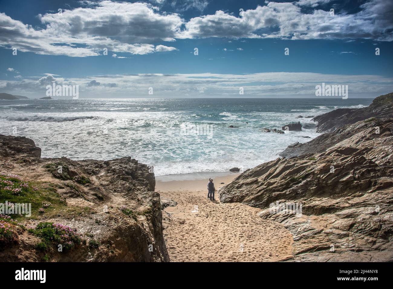 Holidaymakers in the secluded Little Fistral cove on the coast at Towan ...
