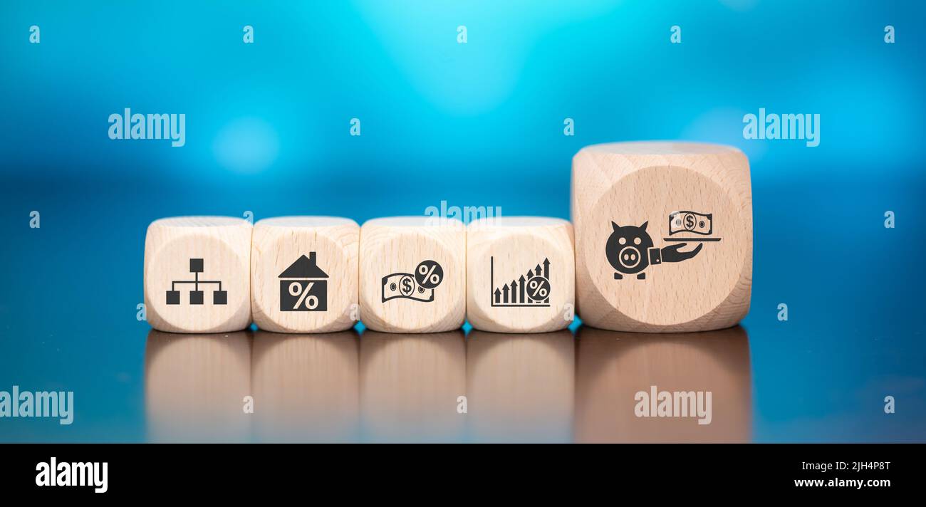 Wooden blocks with symbol of roi concept on blue background Stock Photo ...