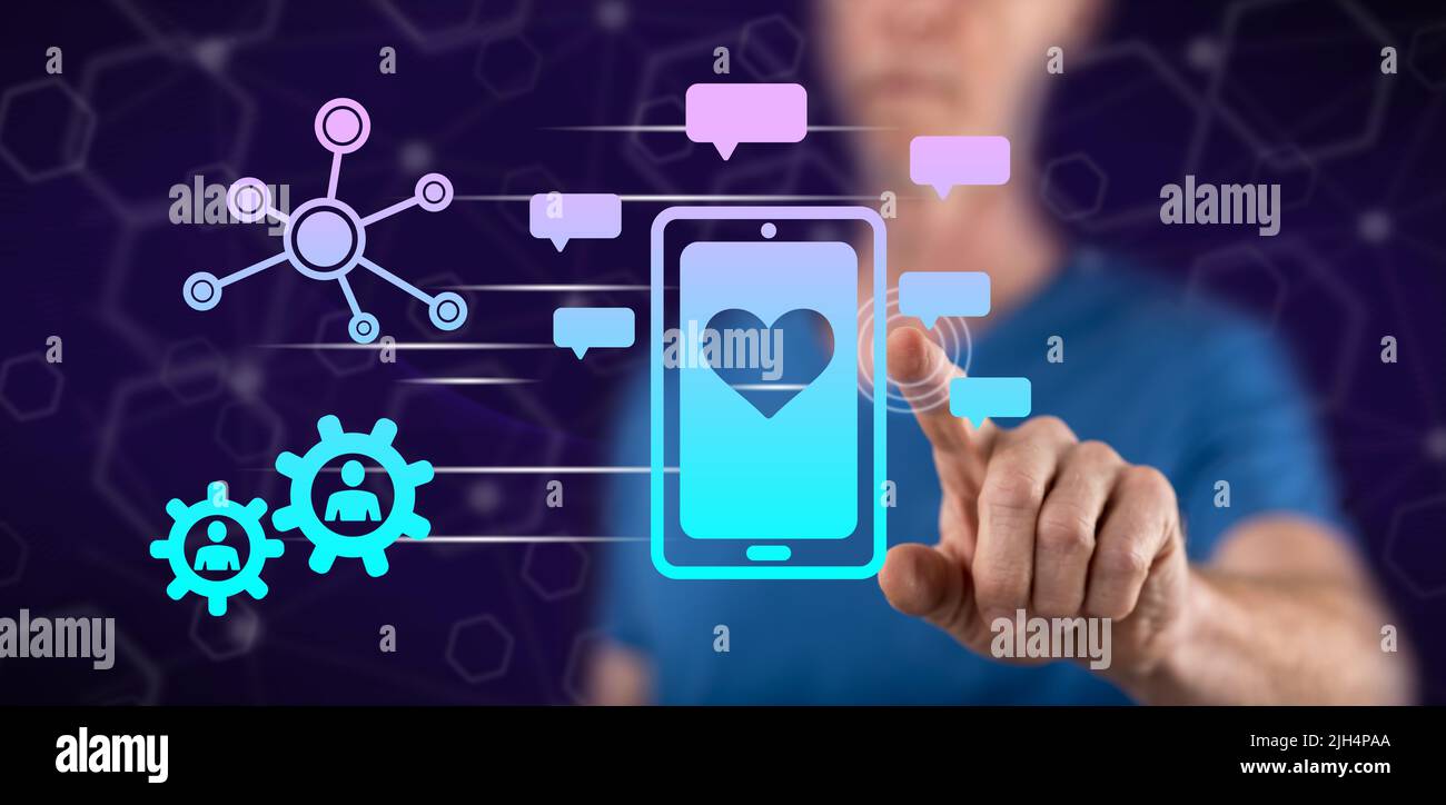 Man touching a social networking concept on a touch screen with his ...