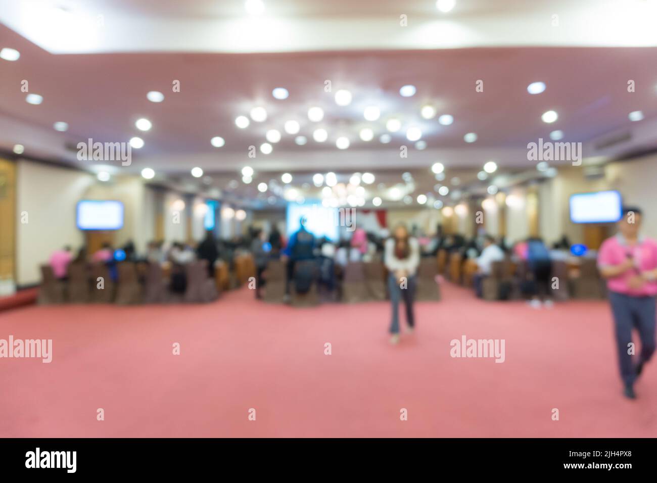 Blurred background group of people in seminar conference hotel room ...