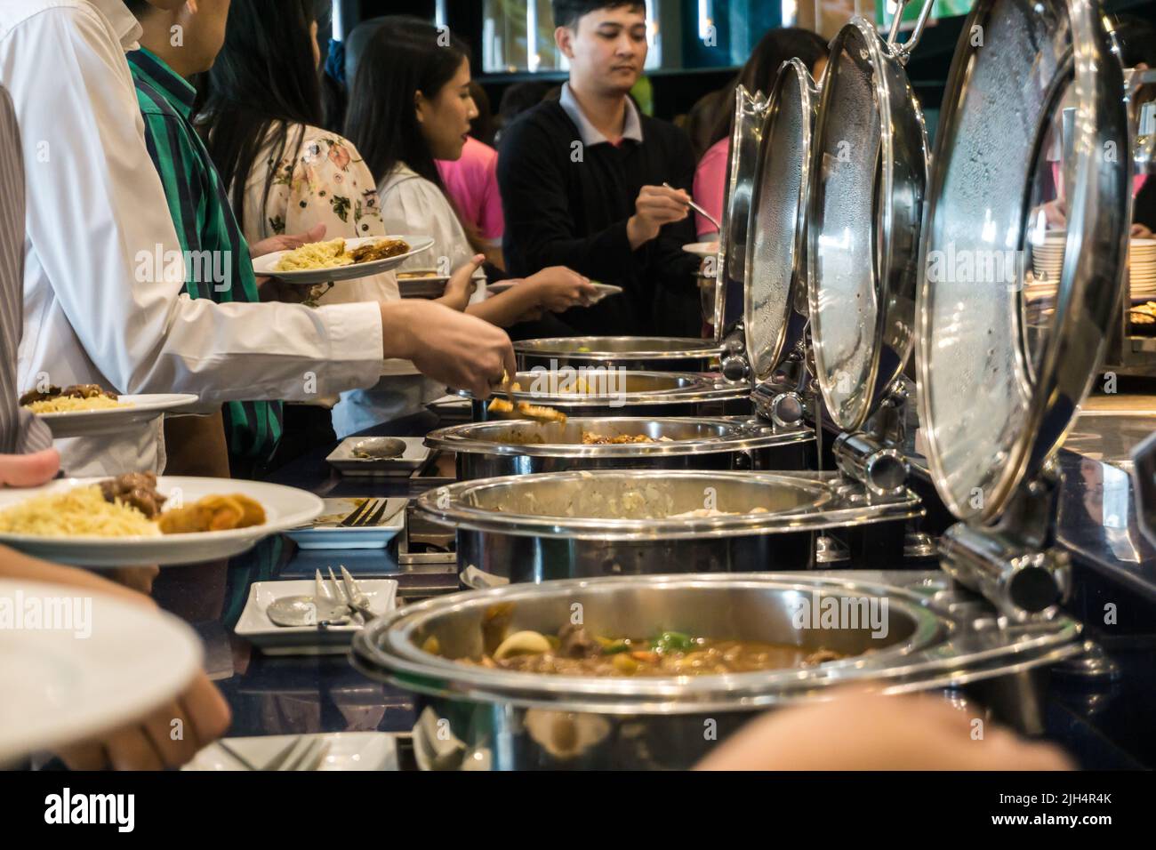 People hand grab buffet food seminar in hotel food and drink business ...