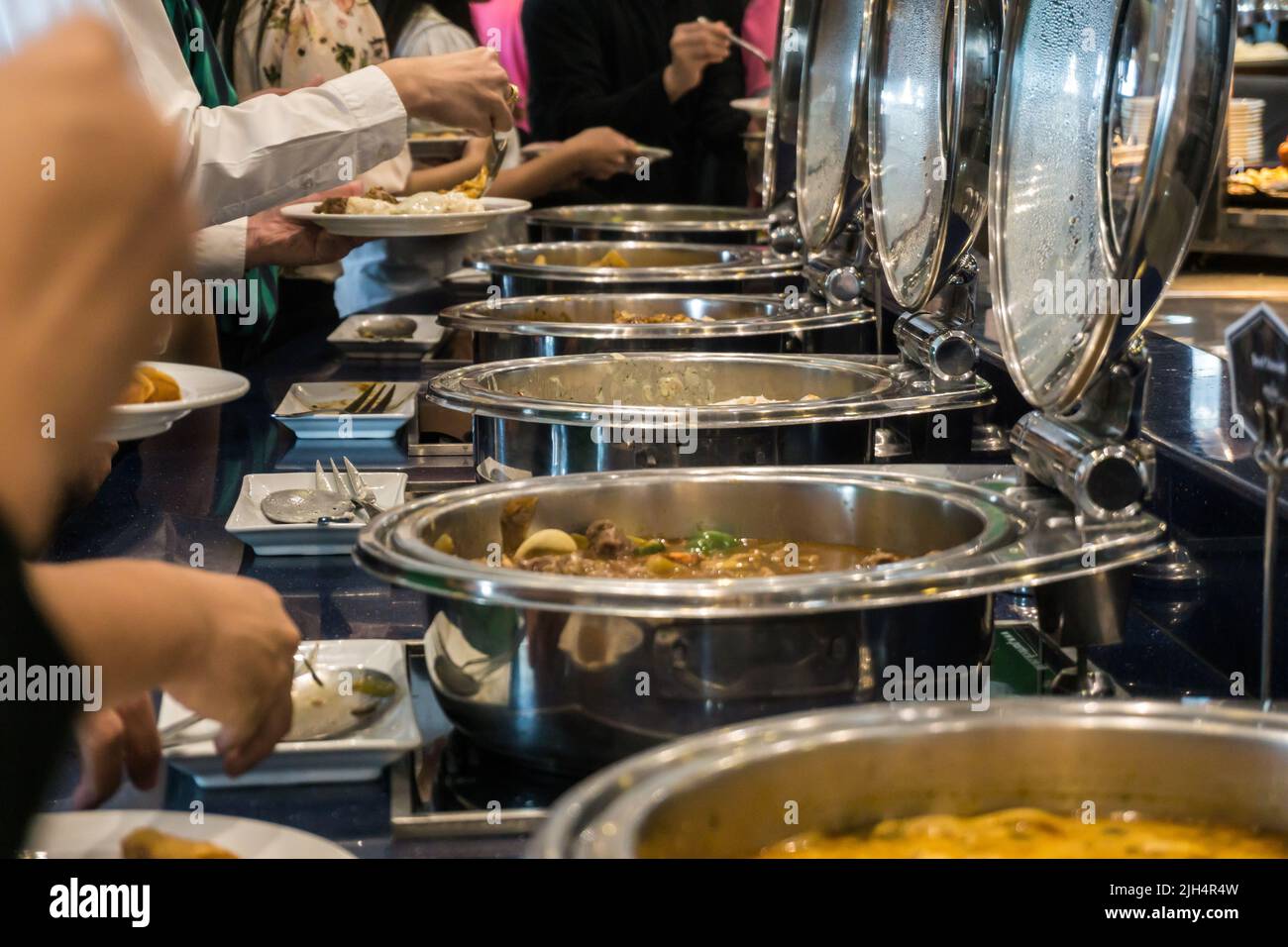 People hand grab buffet food seminar in hotel food and drink business ...