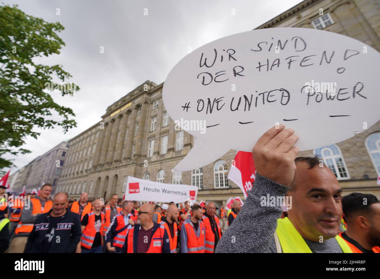 Hamburg, Germany. 15th July, 2022. Port workers with Verdi flags and a ...