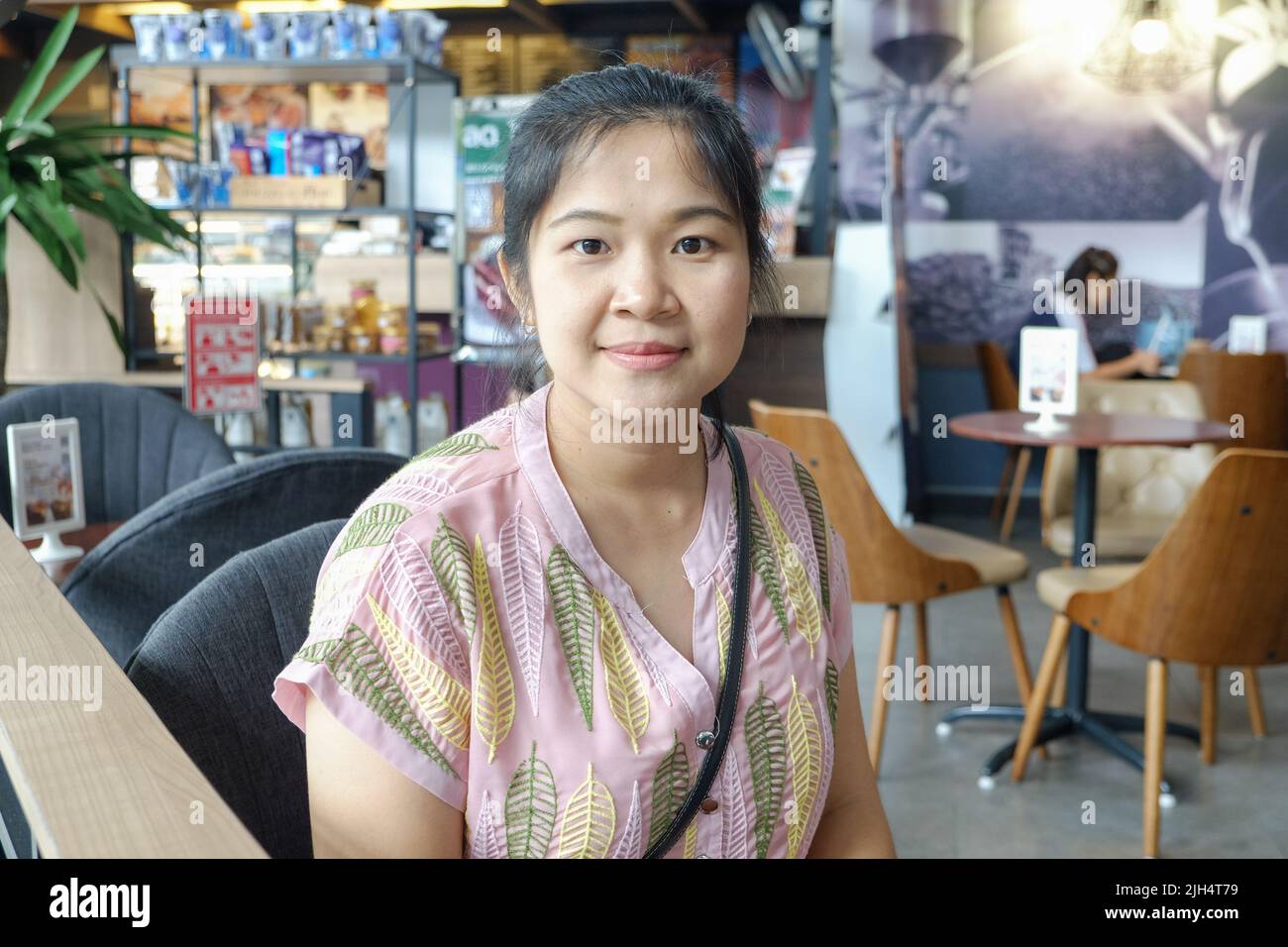 Young asian woman choosing sweet products at grocery supermarket ...