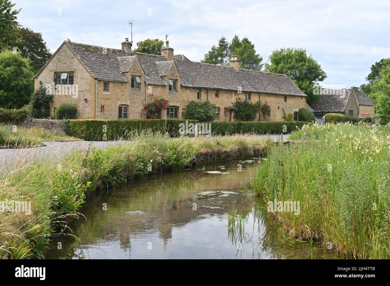 The River Eye flows through the Gloucestershire village of Lower ...