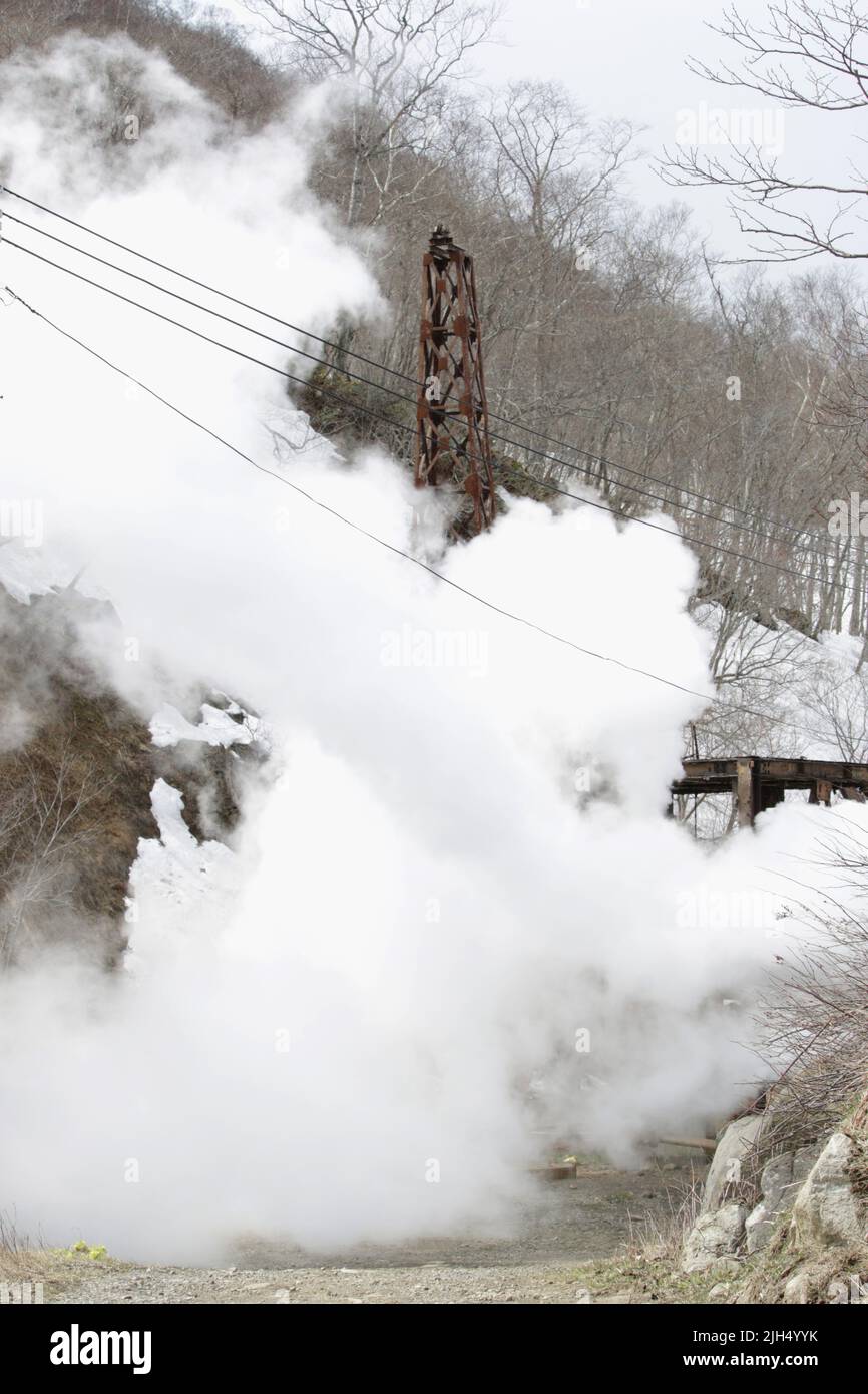 Clouds of steam rising from a hot spring water pump Stock Photo - Alamy