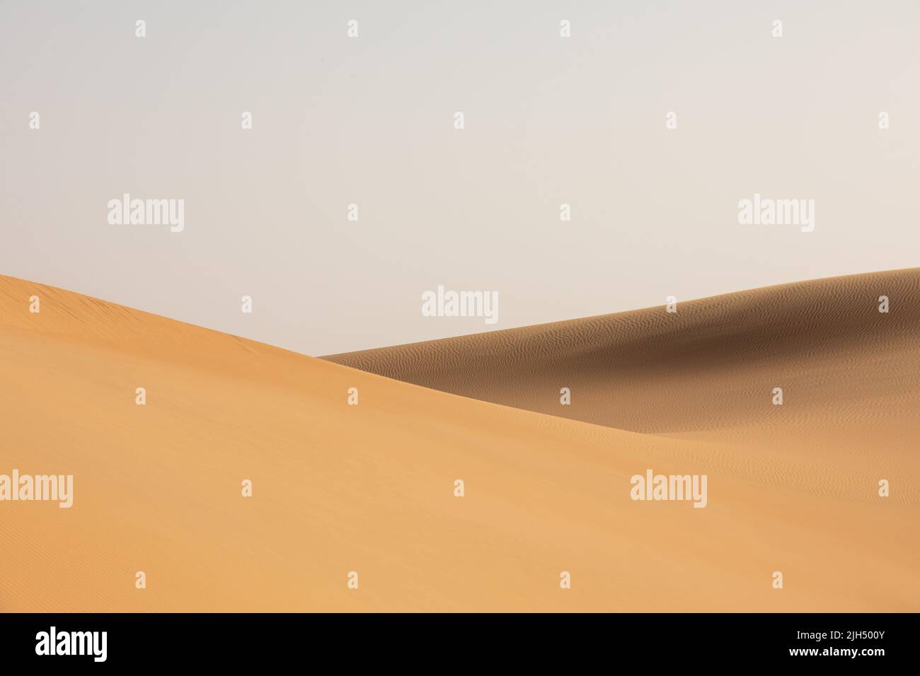 Desert landscape with sand dunes in morning light Stock Photo - Alamy