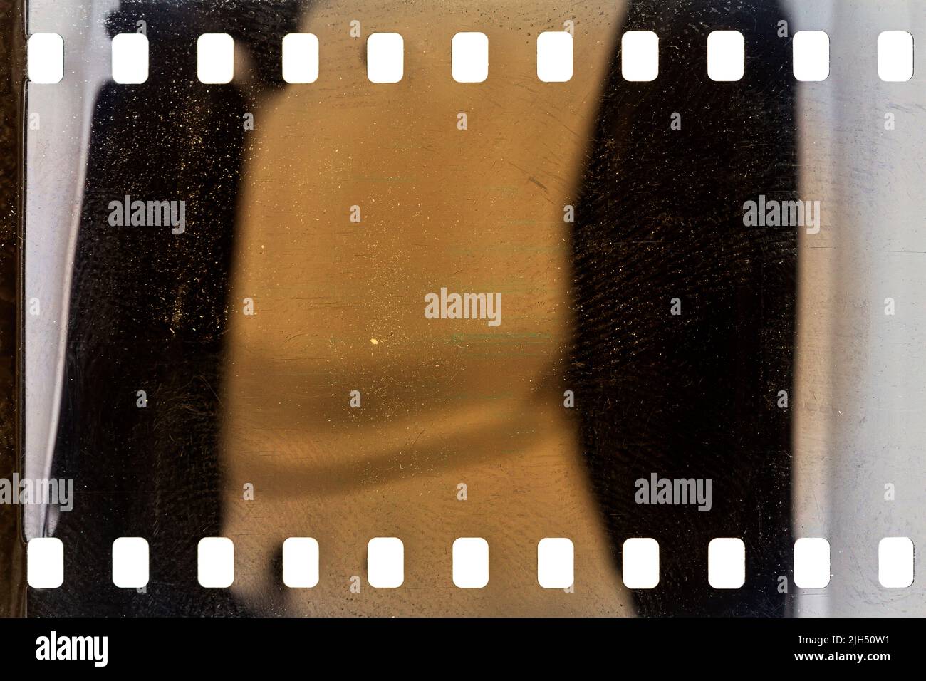 Dusty and grungy 35mm film texture or surface. Perforated scratched ...