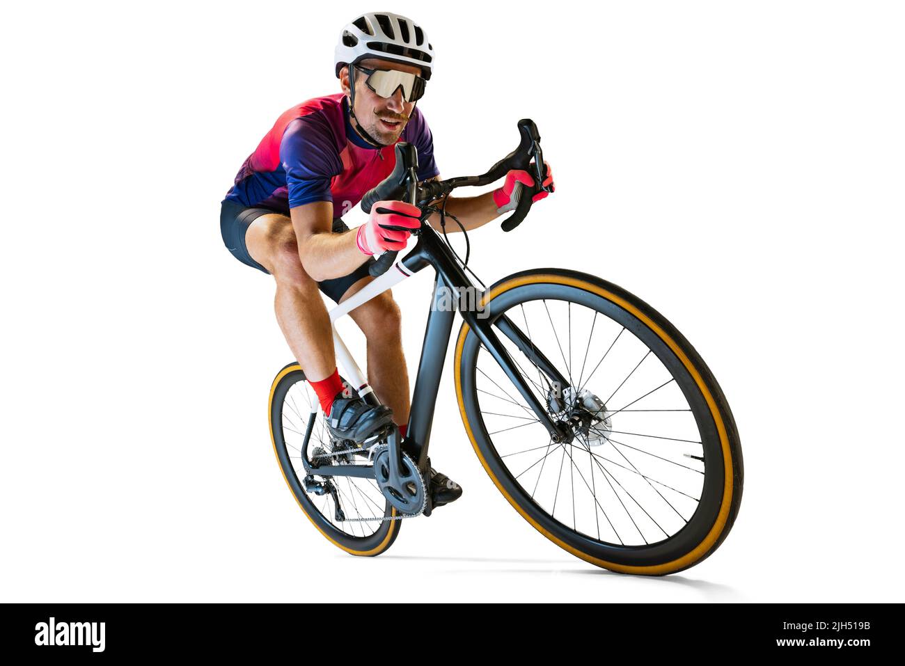 Portrait of man, professional cyclist training, riding isolated over ...