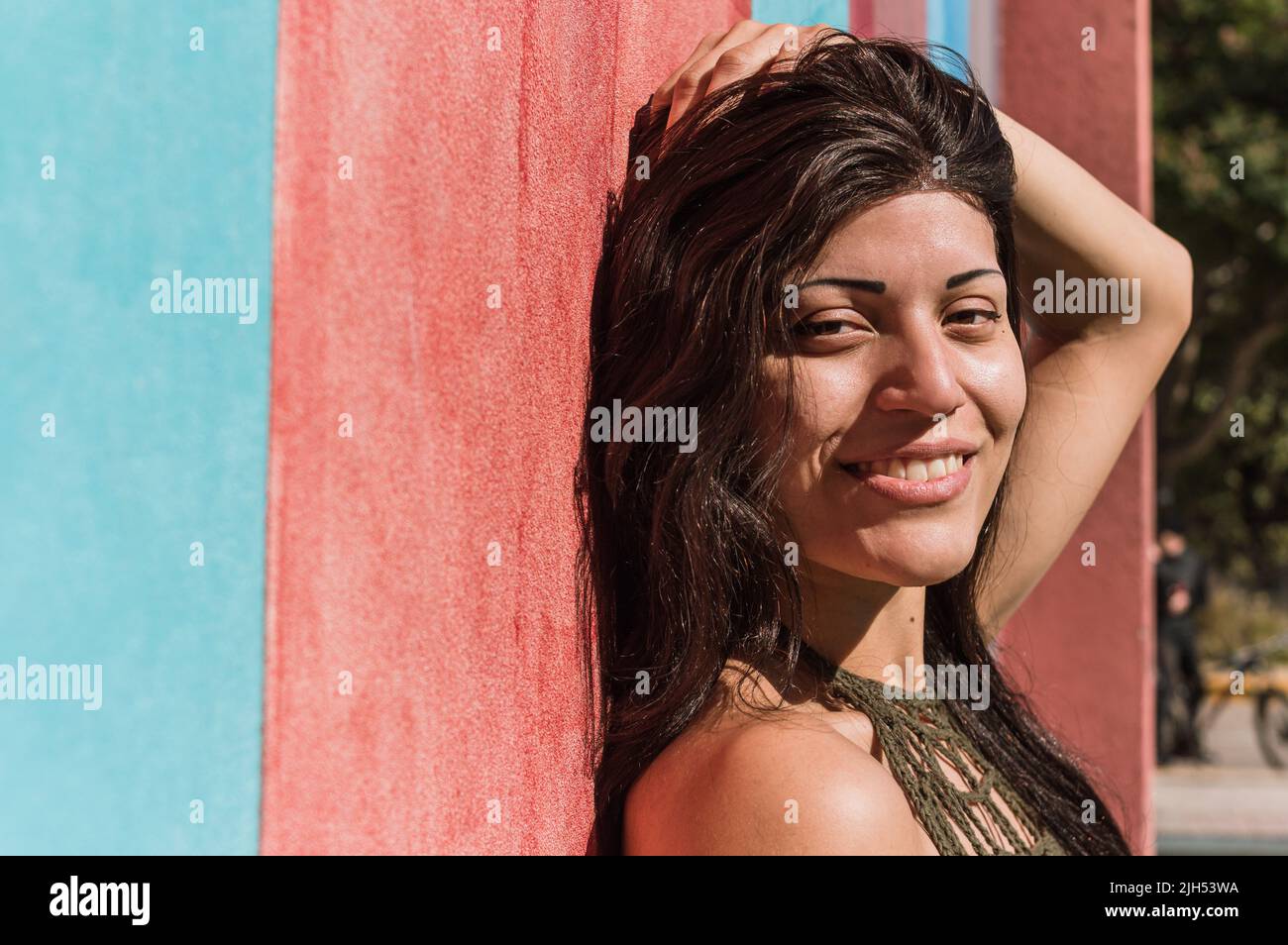 close-up portrait of beautiful young latin caucasian woman leaning ...