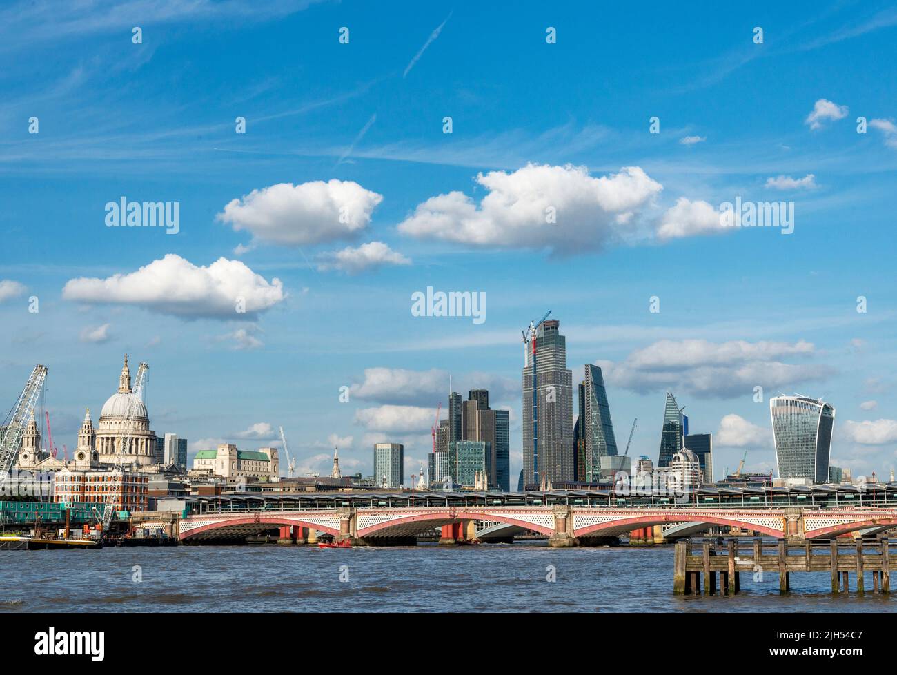 Blackfriars bridge crossing the river Thames in mid distance on a ...