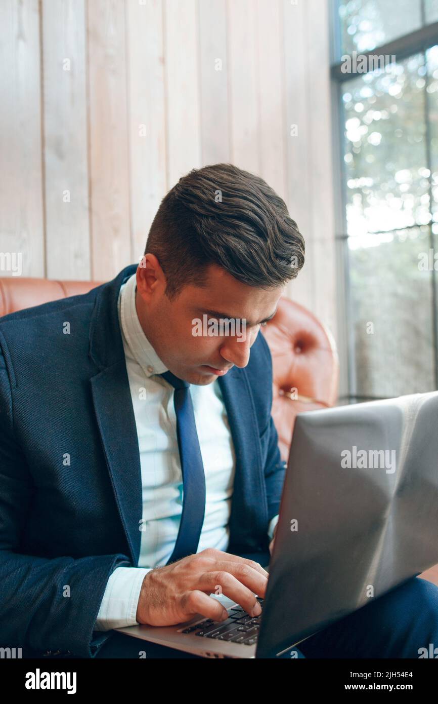 Man searching for information online Stock Photo - Alamy
