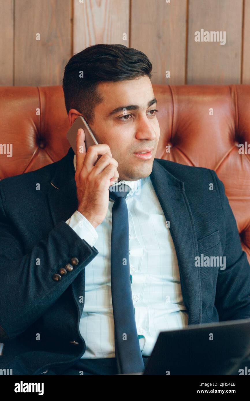 Attractive young businessman making hi-res stock photography and images ...