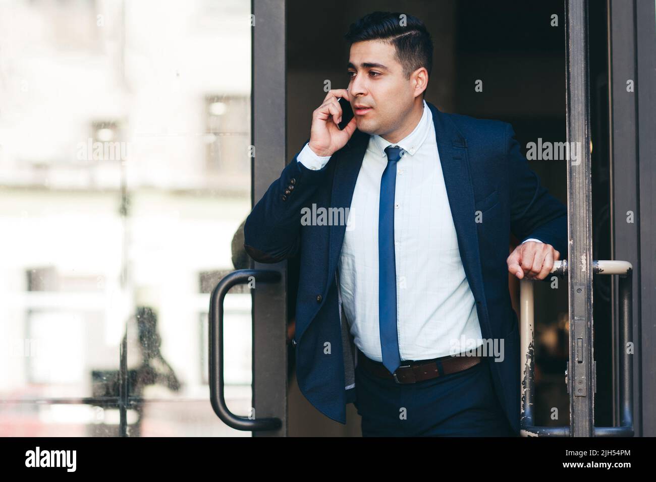 Dynamic businessman and active lifestyle Stock Photo - Alamy