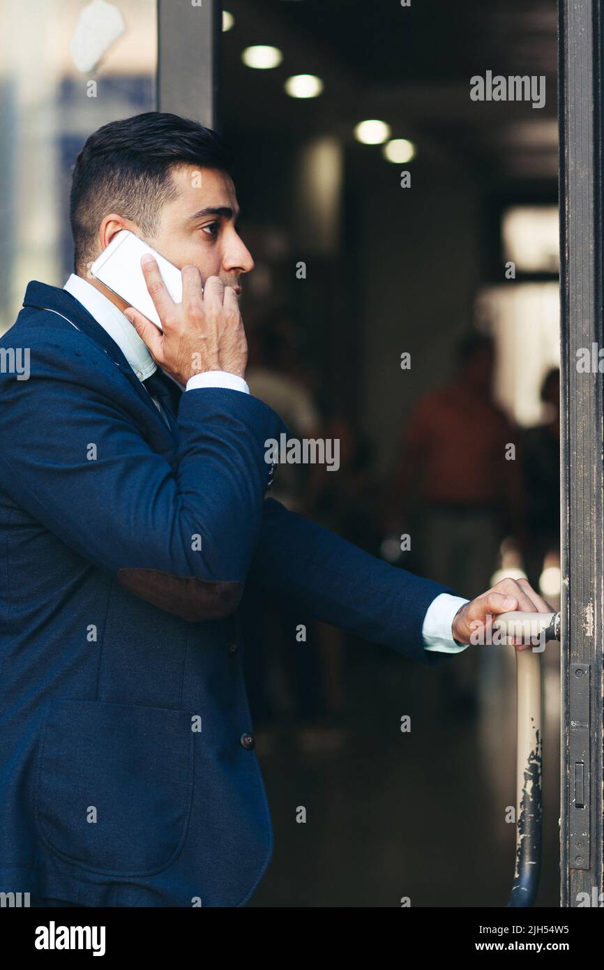 State employee talking on the phone Stock Photo - Alamy