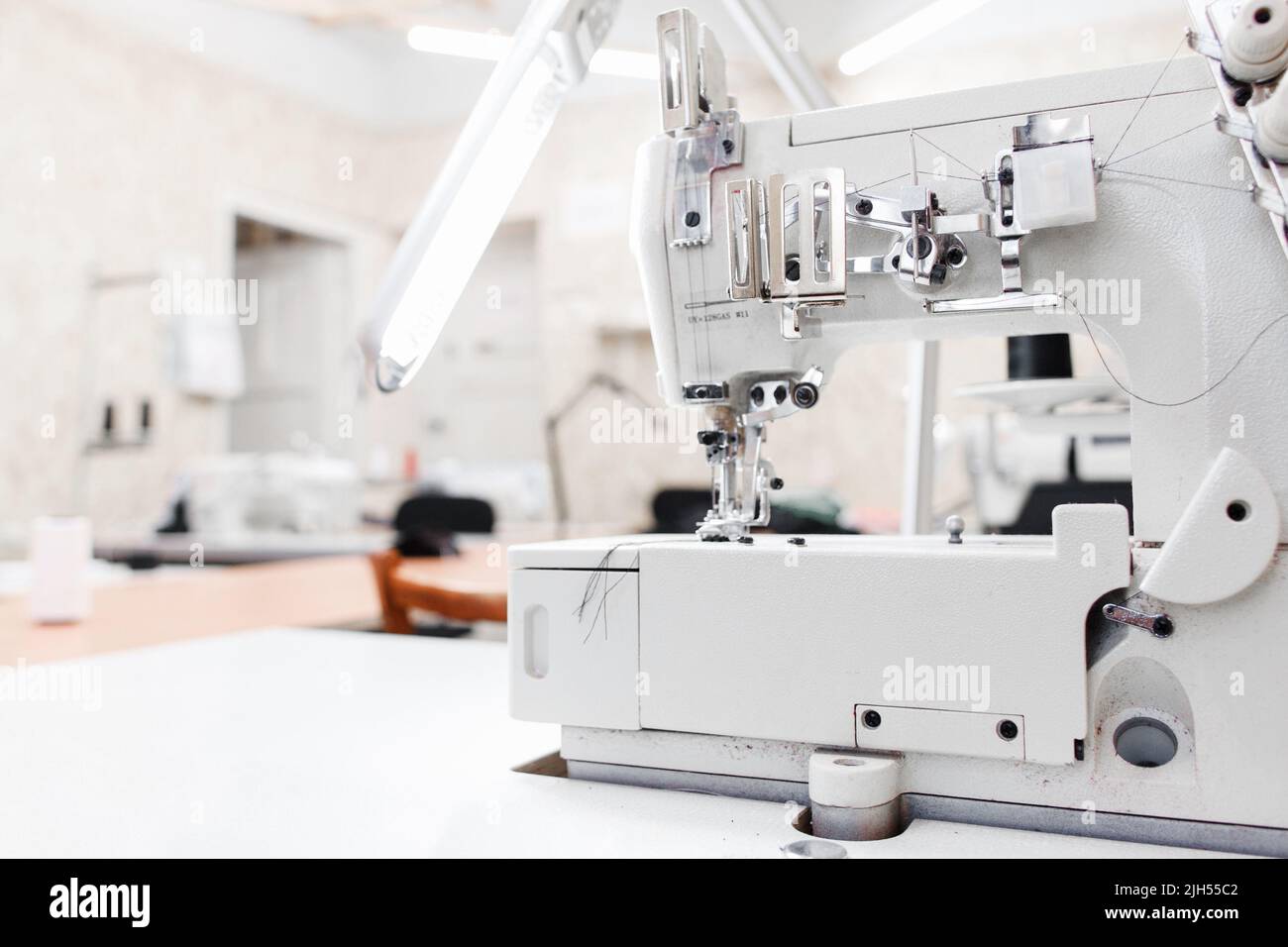 Professional garment factory office, free space Stock Photo - Alamy