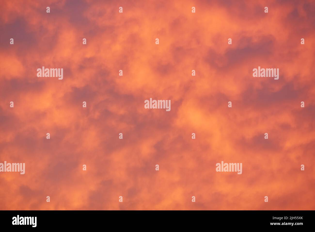 Cloudscape of cumulus sunset clouds with sunlight Stock Photo - Alamy