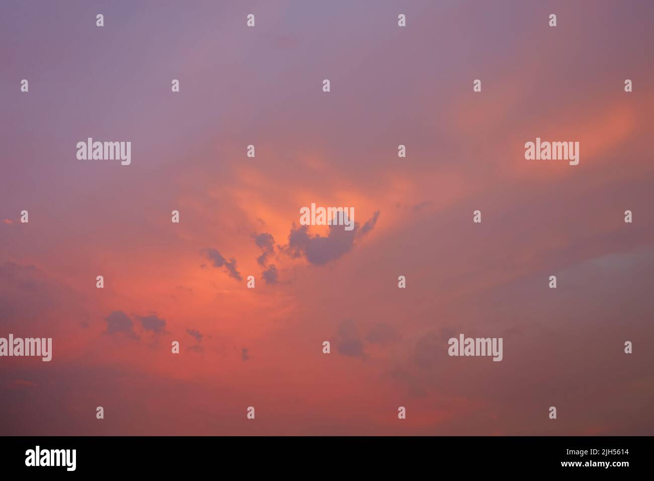 Cloudscape of cumulus sunset clouds with sunlight Stock Photo - Alamy