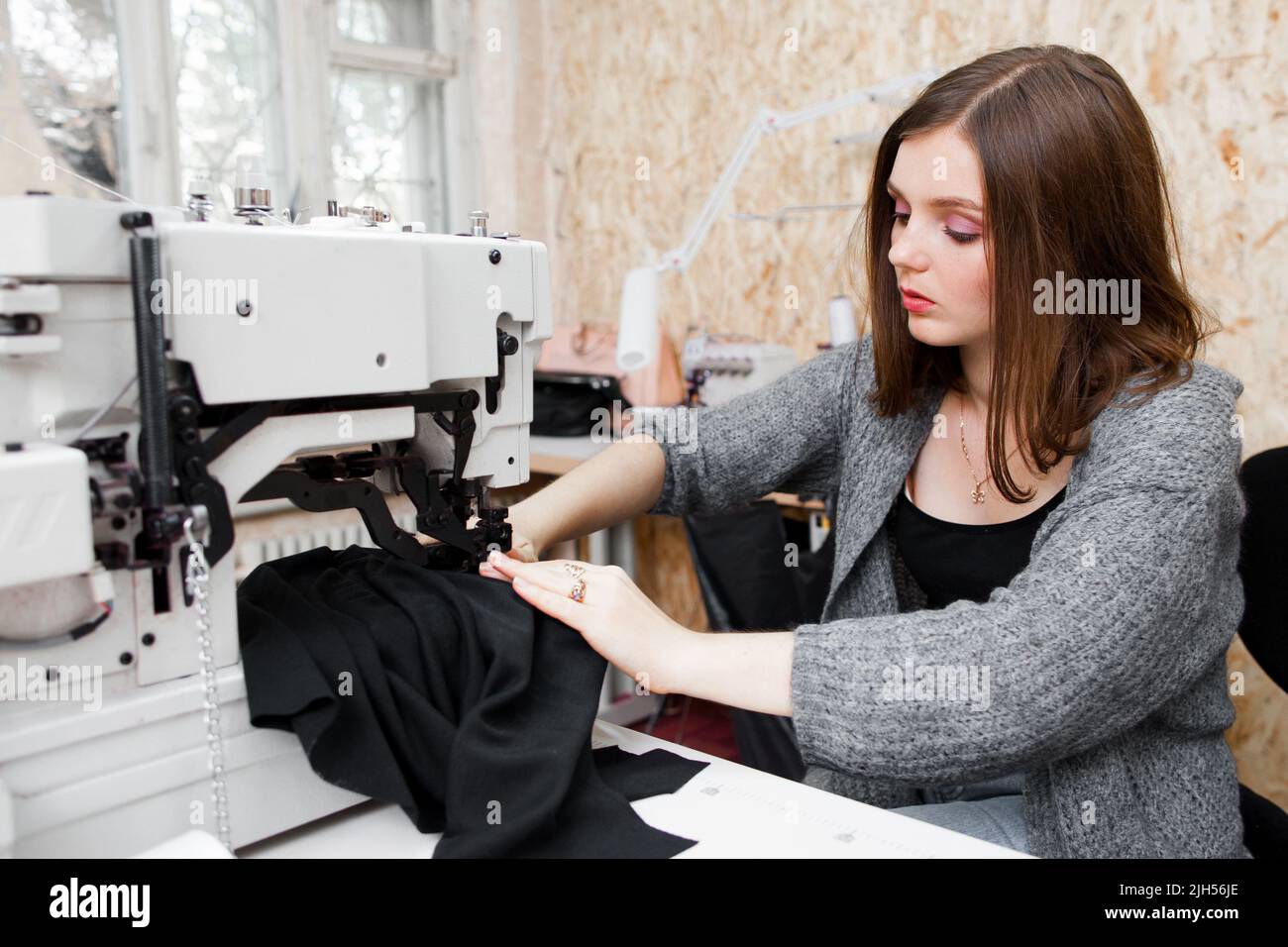 Woman working sewing machine fashion hi-res stock photography and ...