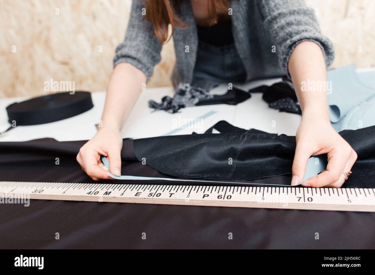 Fashion designer at work measuring tape hi-res stock photography and ...