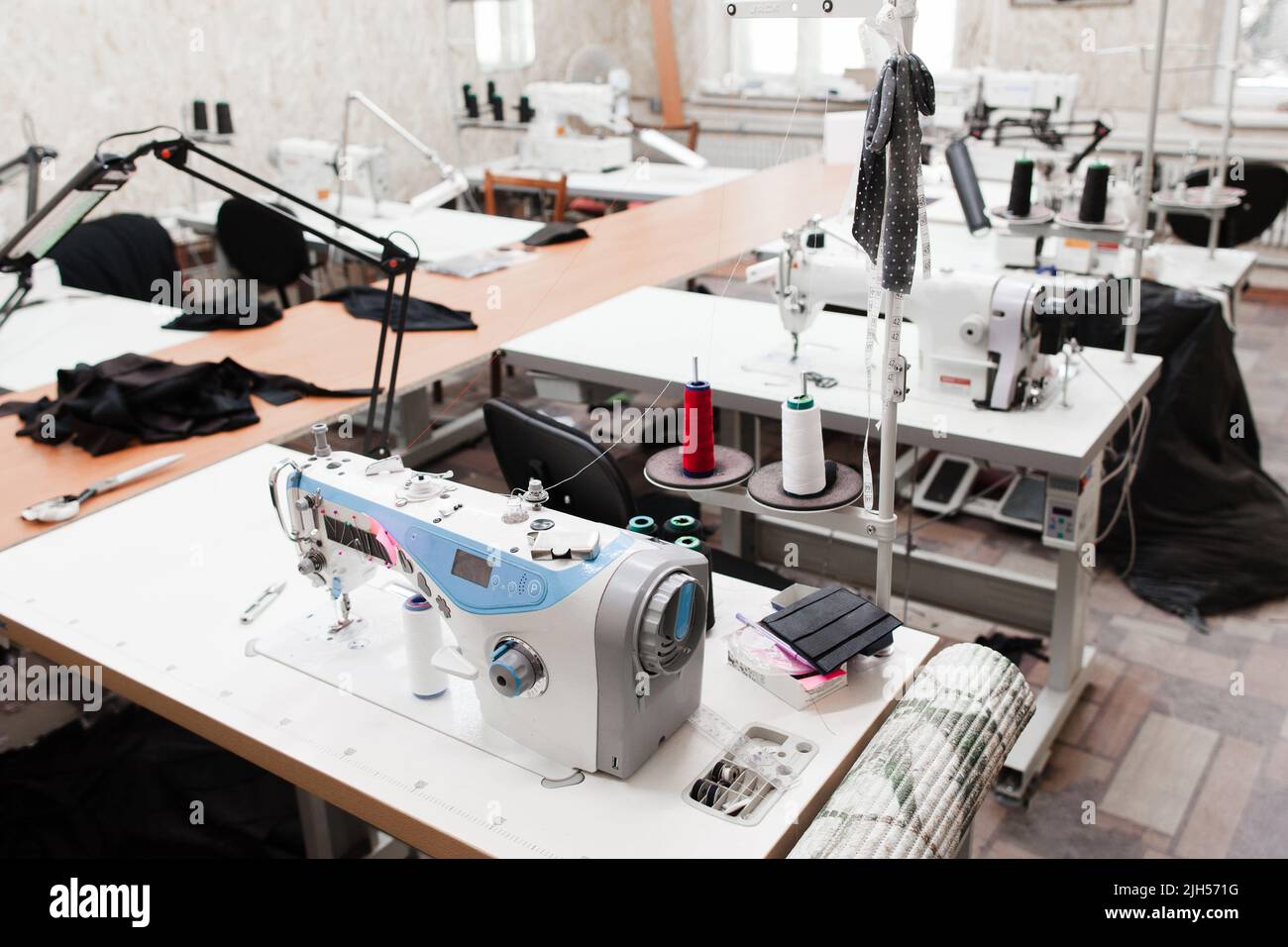 Interior of garment factory shop Stock Photo - Alamy