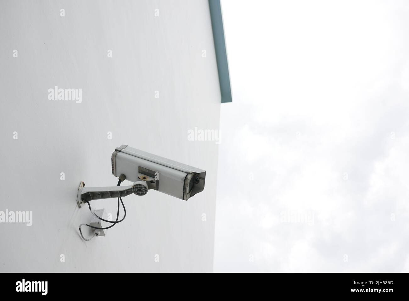 CCTV security camera operating outdoor Stock Photo - Alamy