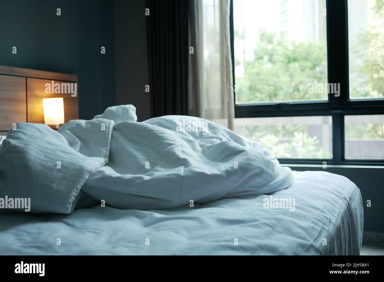 messy bed in early morning , messy bed after waking up Stock Photo - Alamy