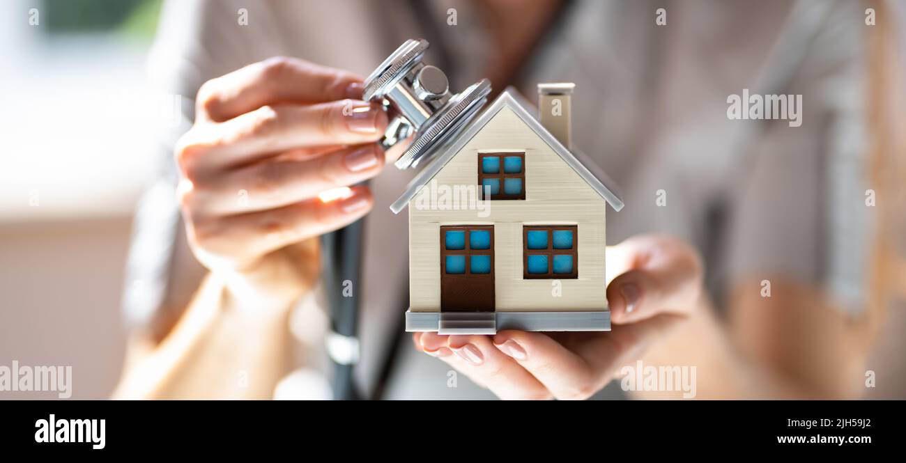 Doctor Doing Homecare Inspection. House Property Check Stock Photo - Alamy