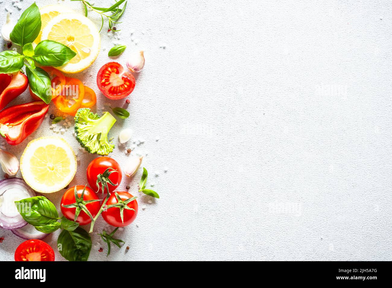 Food cooking background on white table Stock Photo - Alamy