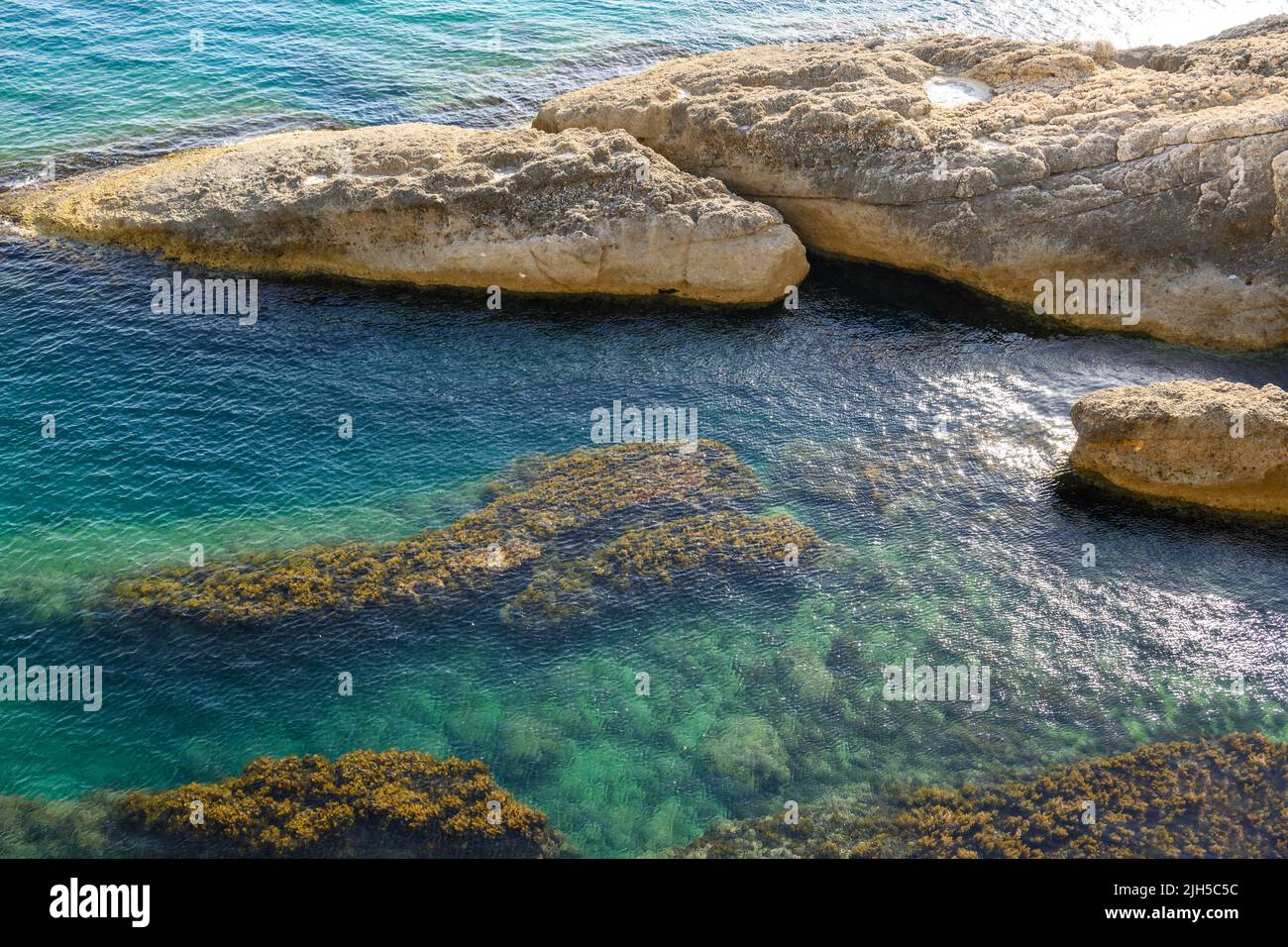 Rocks and turquoise waters of the Adriatic Sea. Montenegro, Europe ...