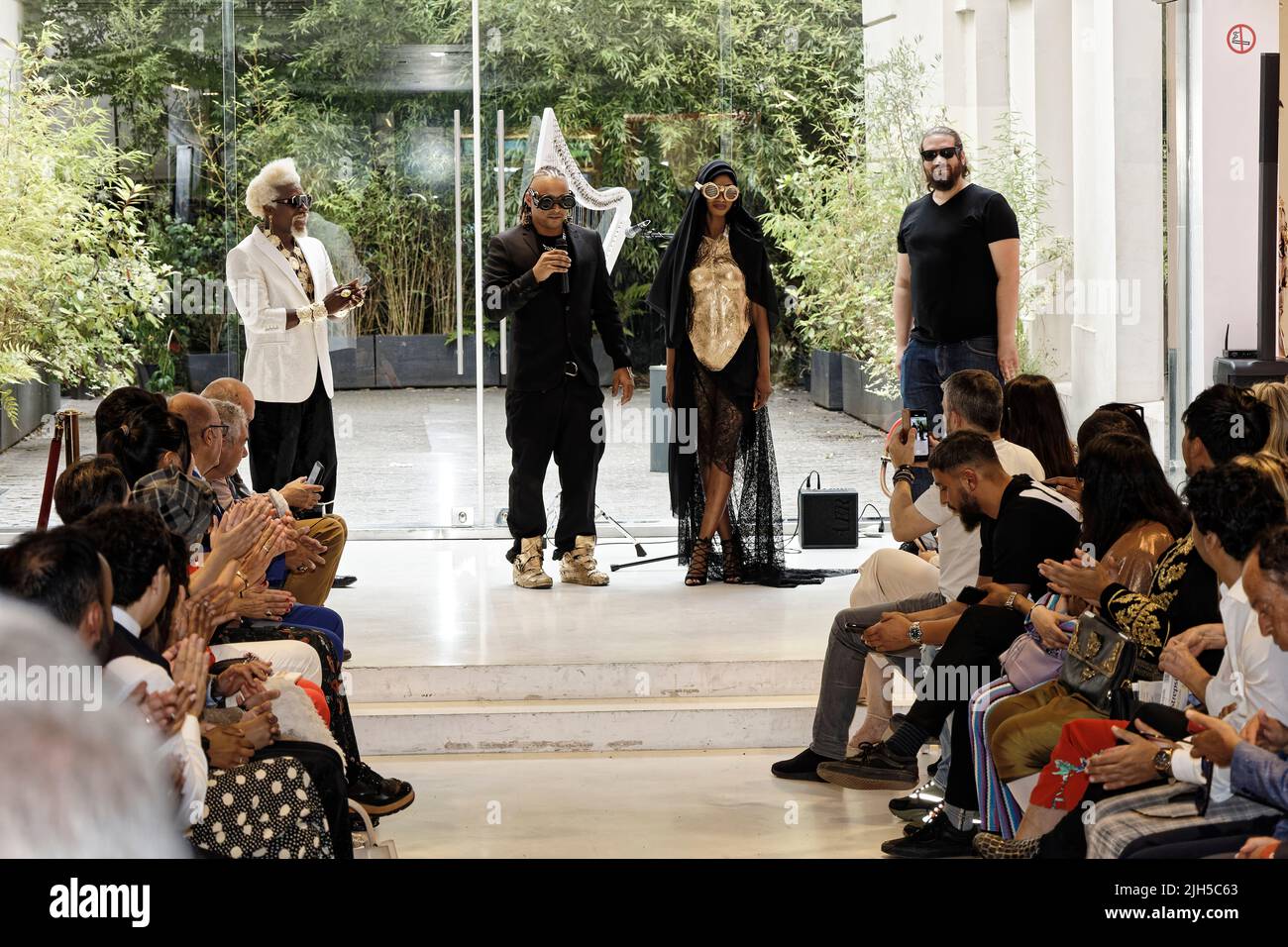 Paris, France. 6th July, 2022. Anggy Haif, designer Dem Dillon (C) and ...