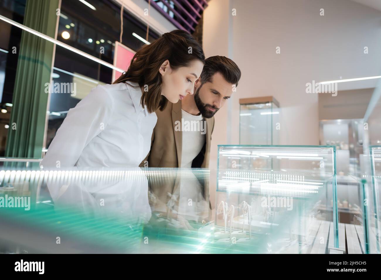 Jewelry saleswoman and customer hi-res stock photography and images - Alamy