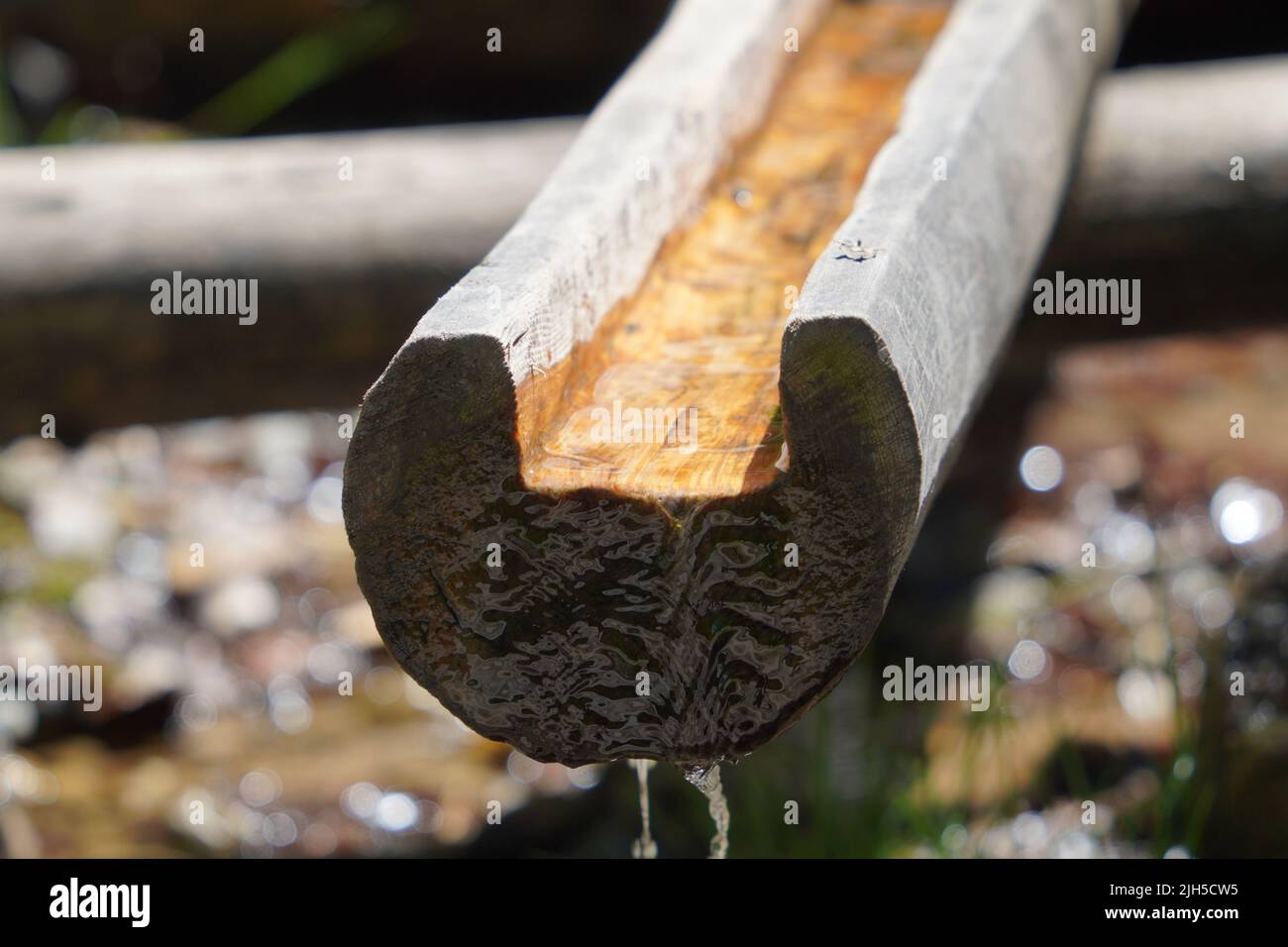 Wooden channel with spring water hi-res stock photography and images ...