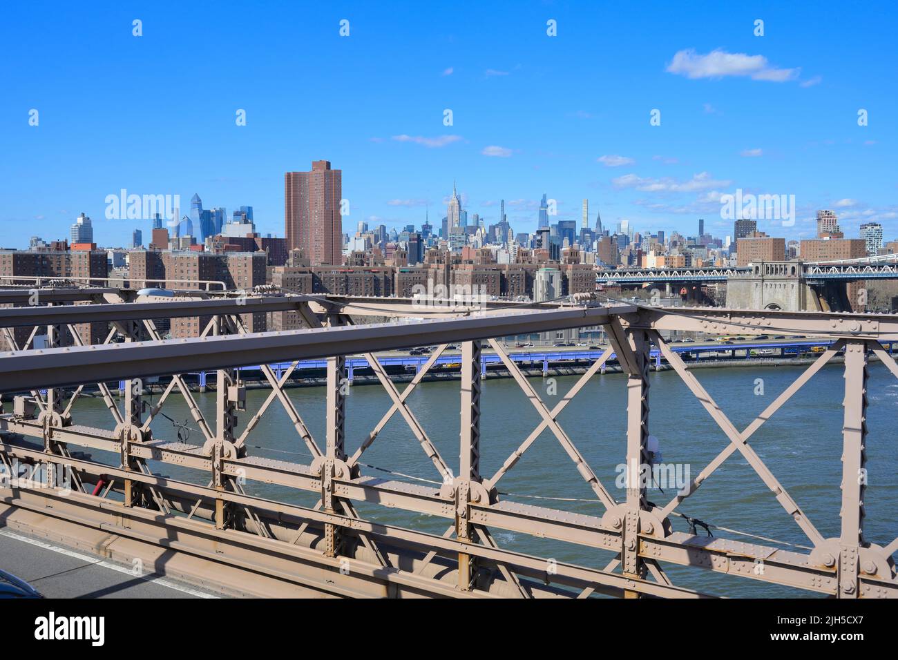 The iconic Brooklyn bridge on a crisp spring day, New York City NY ...