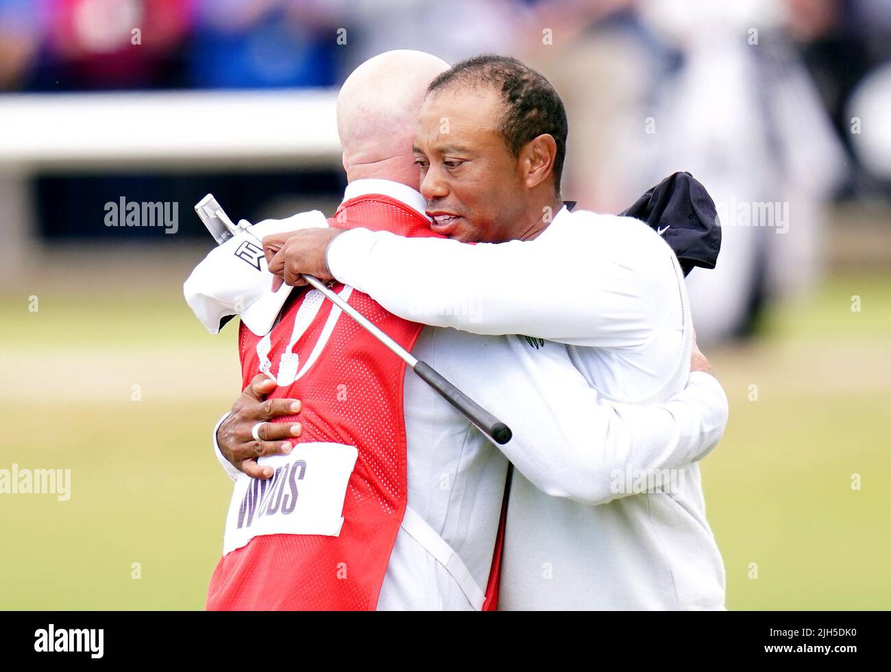 USA's Tiger Woods (right) hugs his caddie Joe LaCava after finishing ...
