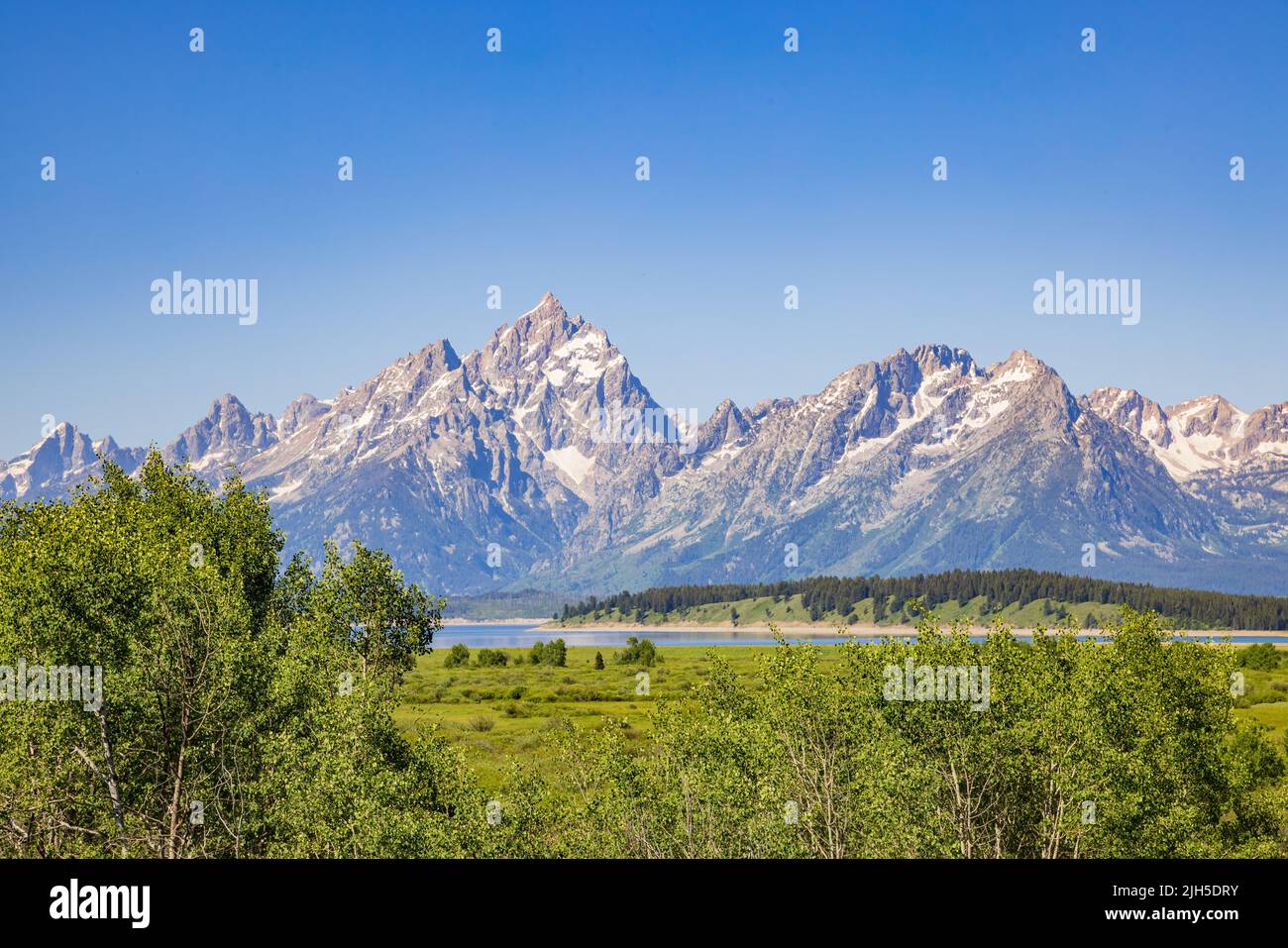 Sunny view of the Teton mountain range of Grand Teton National Park at ...