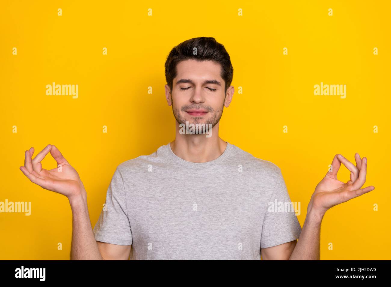 Photo of rest brunet millennial guy sleep wear trend cloth isolated on ...