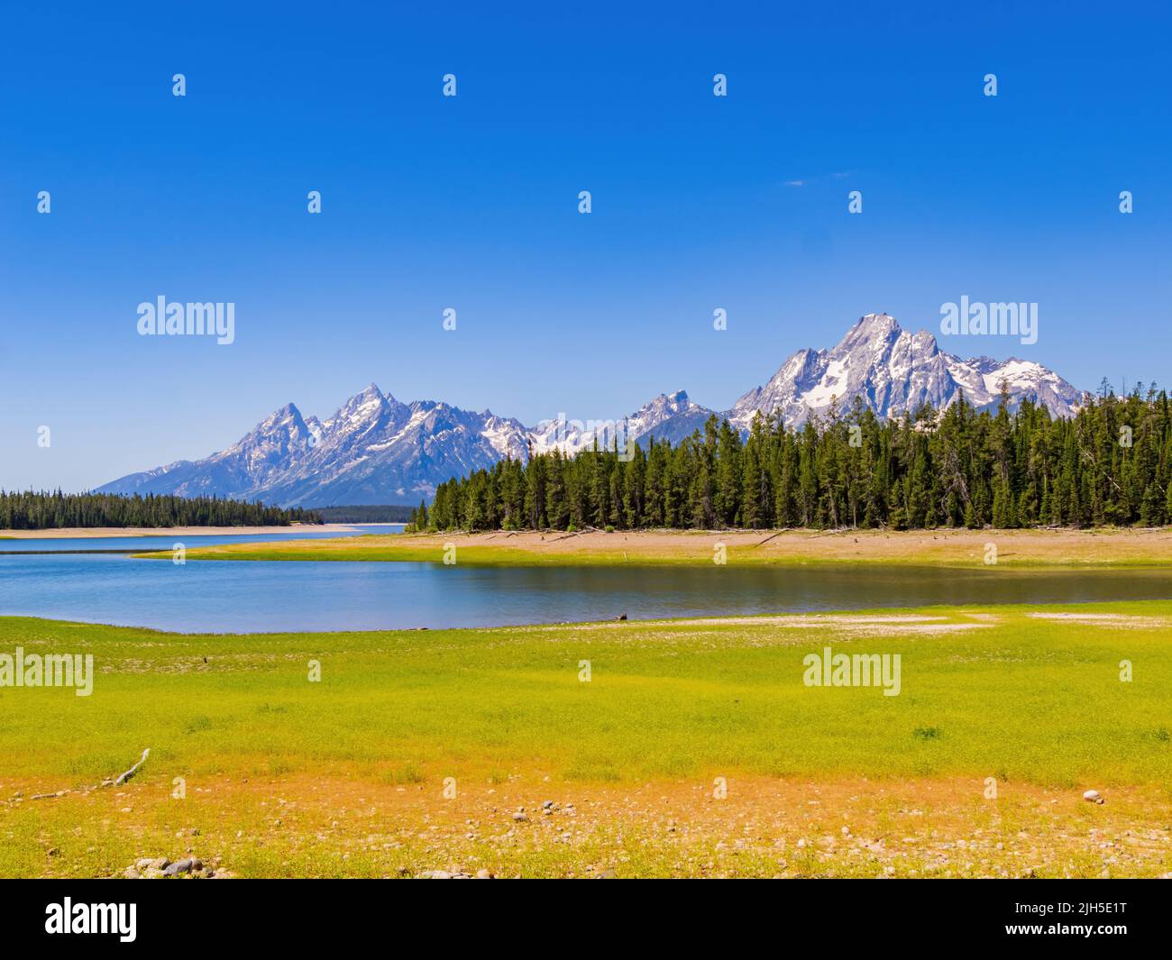 Sunny view of the Teton mountain range of Grand Teton National Park at ...