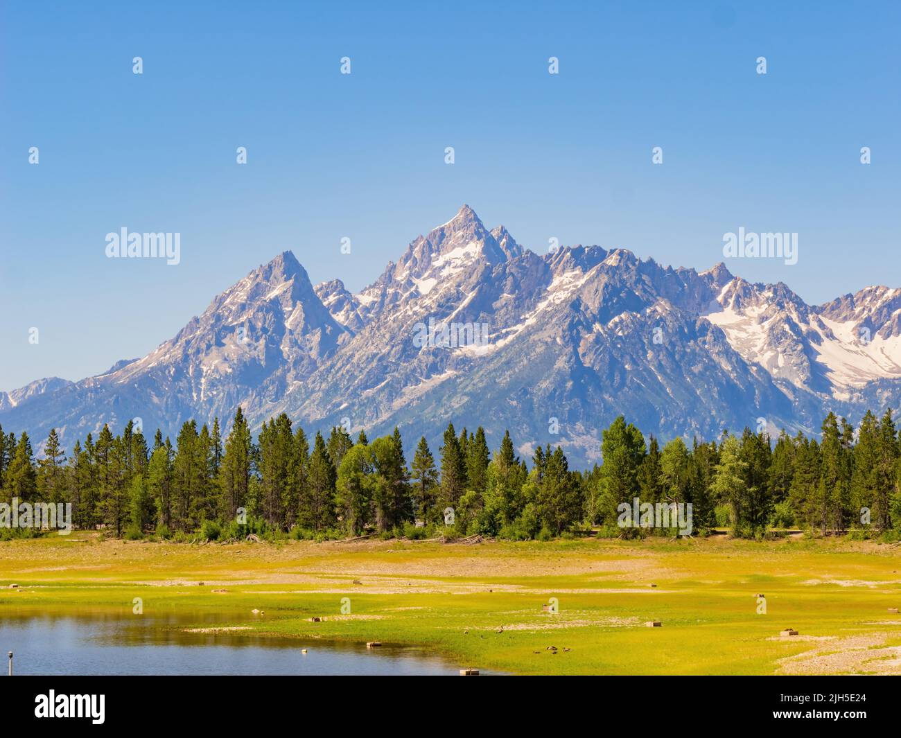 Sunny view of the Teton mountain range of Grand Teton National Park at ...