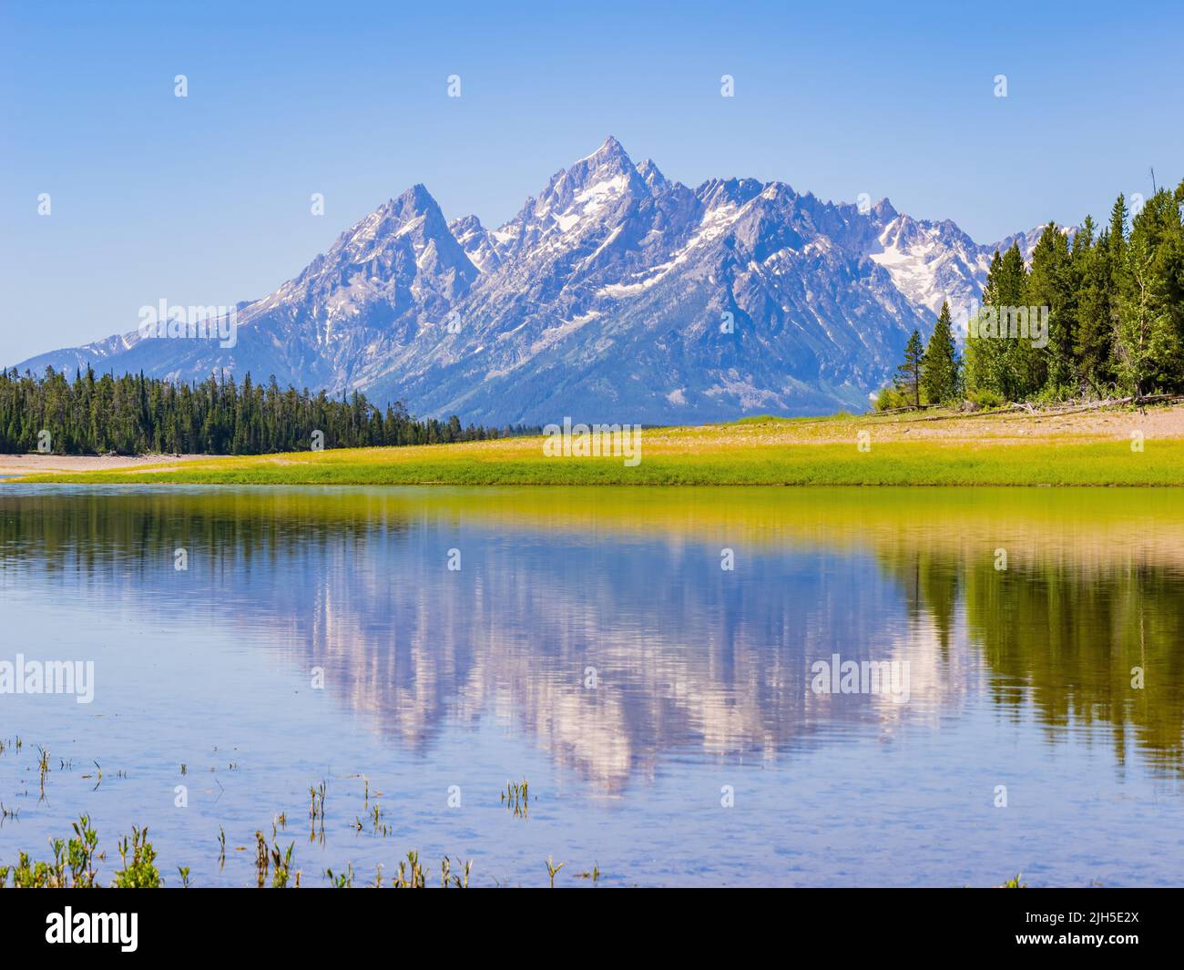 Sunny view of the Teton mountain range of Grand Teton National Park at ...
