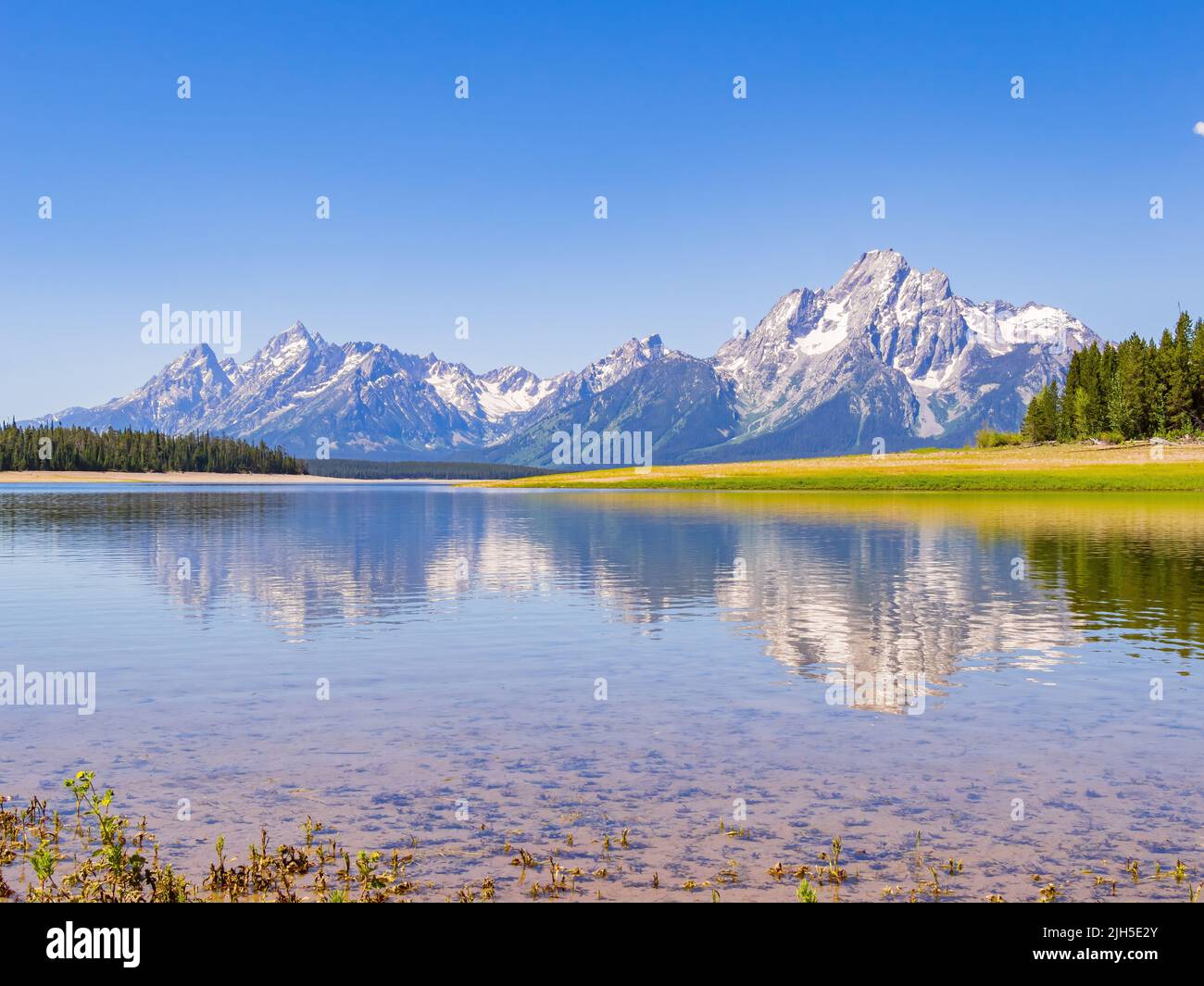 Sunny view of the Teton mountain range of Grand Teton National Park at ...