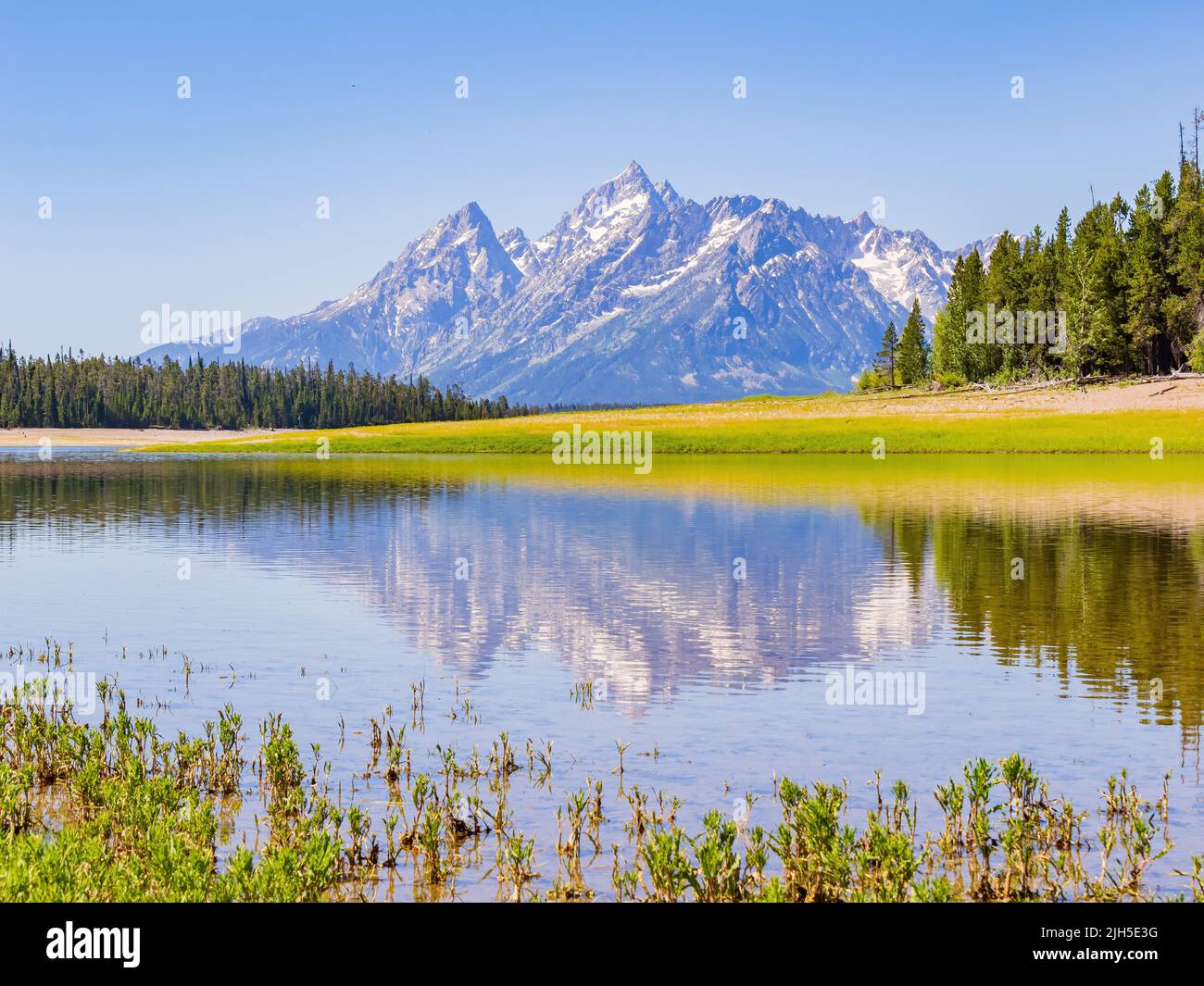 Sunny view of the Teton mountain range of Grand Teton National Park at ...