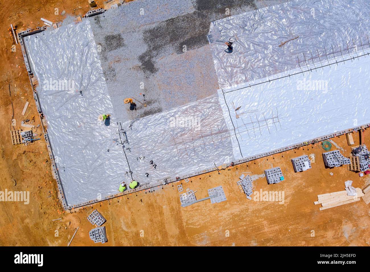 During construction of a building, barrier plastic will be installed ...