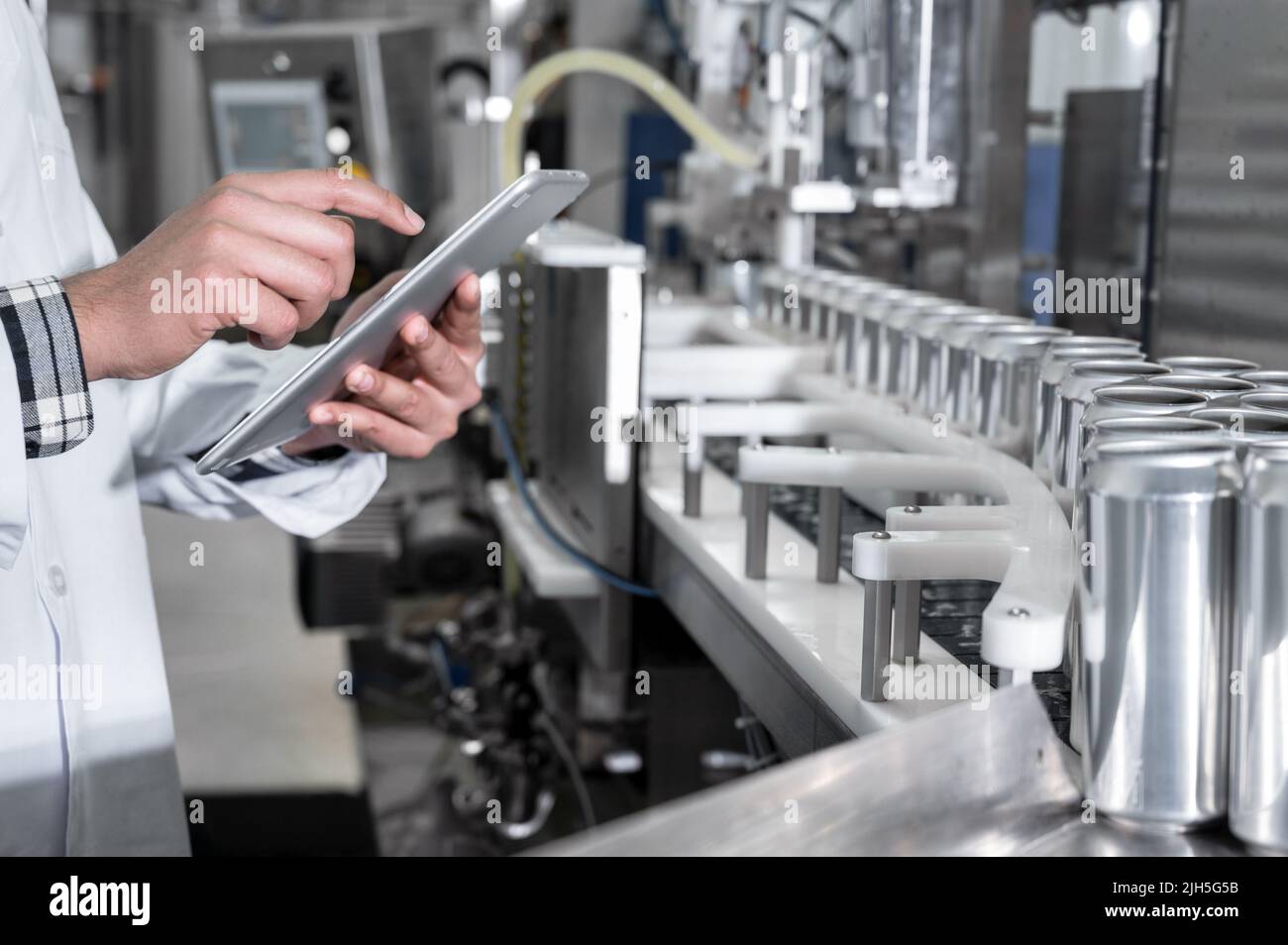 Work in modern brewery, data collection and production monitoring. High ...