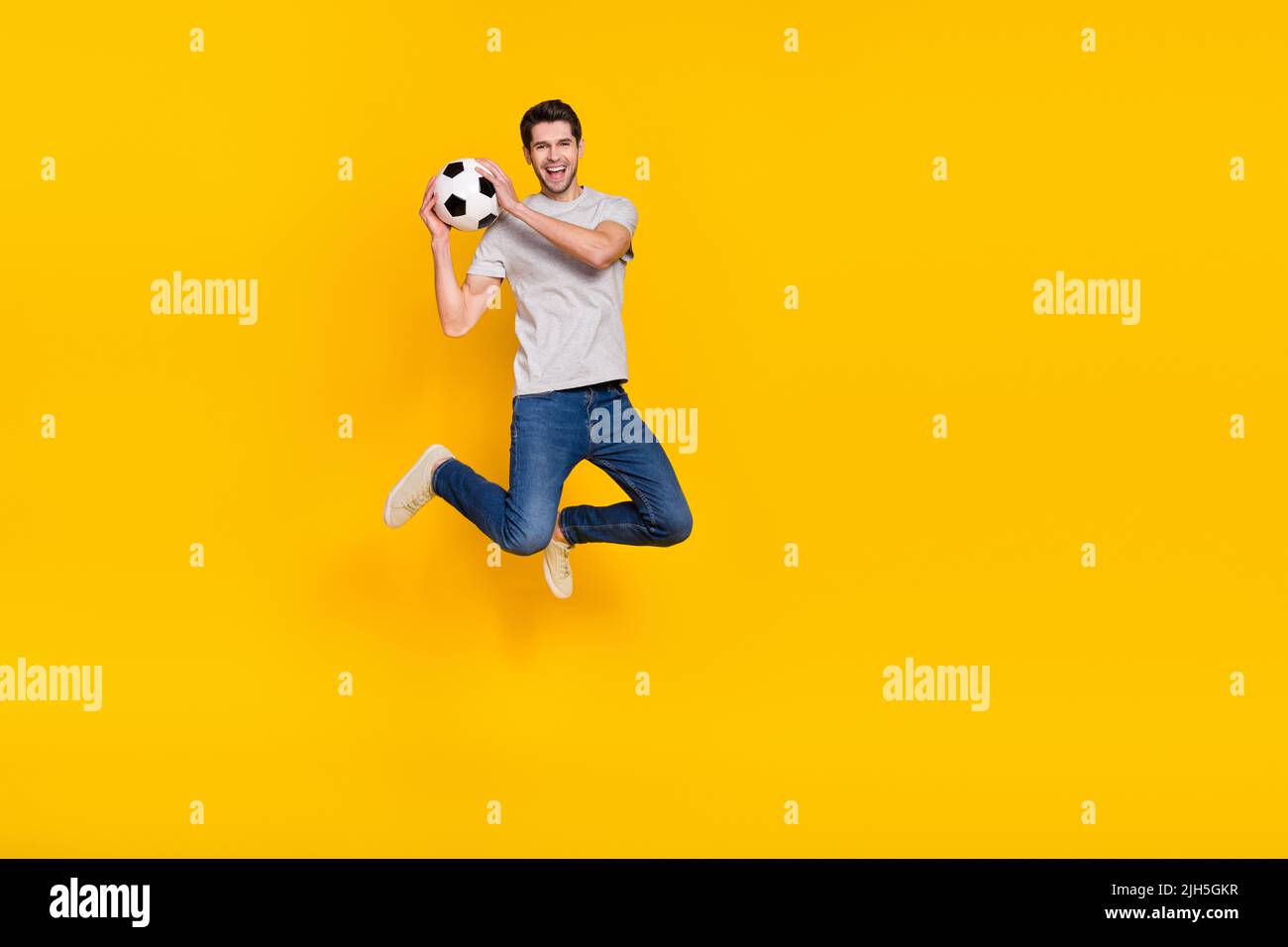Full length body size view of attractive cheerful guy jumping throwing ...