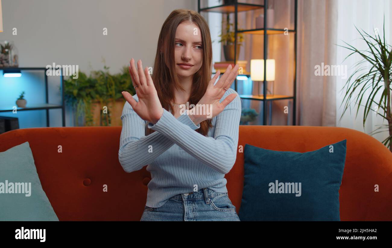 Stop gesture. Angry woman say No hold palm folded crossed hands ...