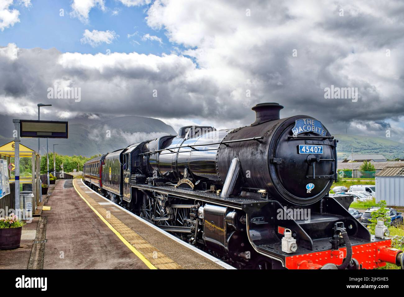FORT WILLIAM SCOTLAND THE JACOBITE STEAM TRAIN PASSING THROUGH BANAVIE ...