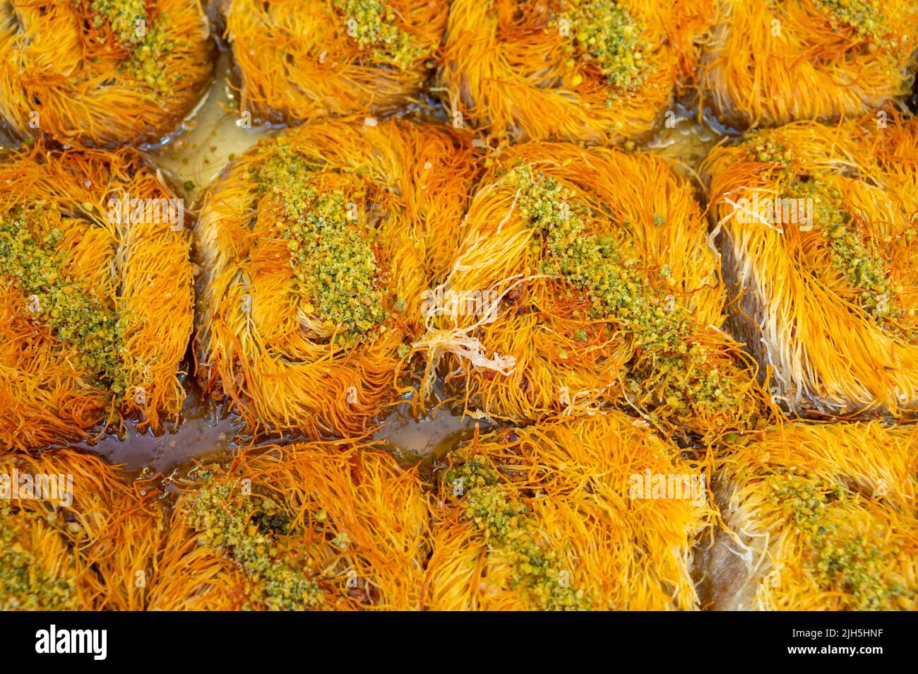 Turkish or arabic sweet dessert, baklava burma kadayif made from filo ...