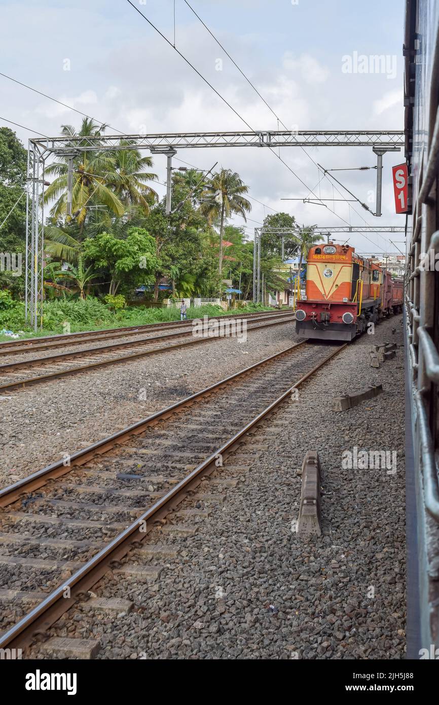 A train is coming to station in India Stock Photo - Alamy