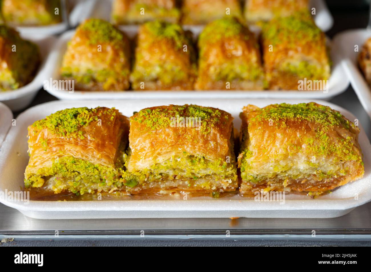 Turkish or arabic sweet dessert, baklava made from filo pastry, filled ...